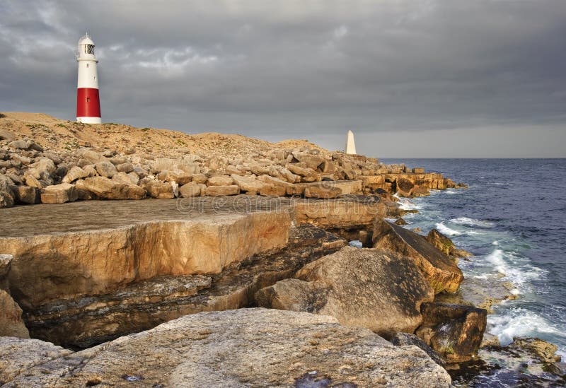 Victorian Lighthouse on Cliffs at Sunset Stock Image - Image of rocks ...