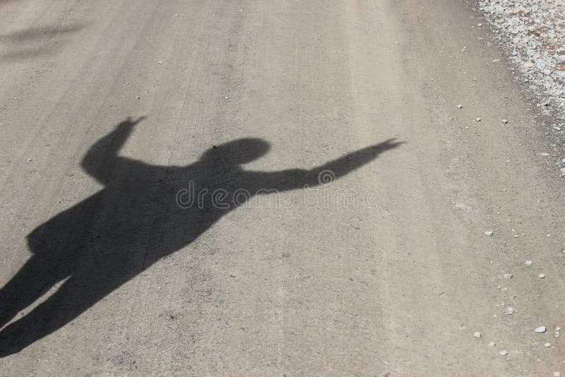 Victory shadow stock photo. Image of person, sign, road - 55328366
