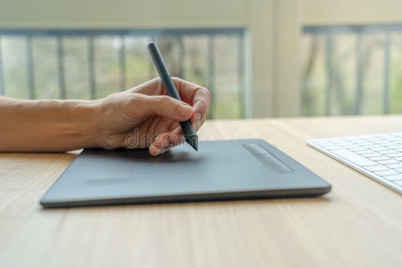 Video Artist Using Graphics Tablet. Stock Photo - Image of laptop ...