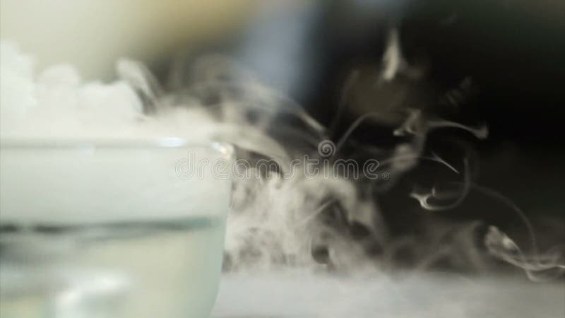 Video Boiling Dry Ice in a Water with Overflowing White Smoke Stock ...