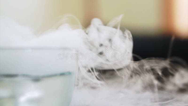 Video Boiling Dry Ice in a Water with Overflowing White Smoke Stock ...