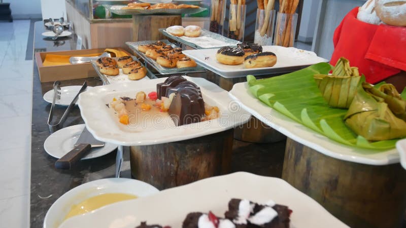 Video of the Bread Section at a Breakfast Buffet Featuring a Variety of ...