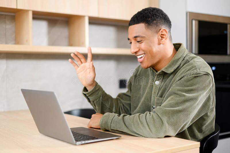 Video Call. Attractive Multiracial Guy is Using Laptop for Video ...