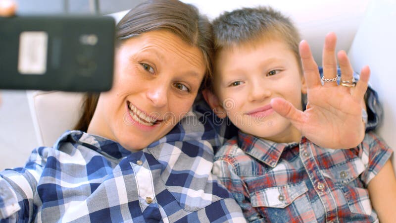 Mother and Son are Making a Video Call Stock Image - Image of ...