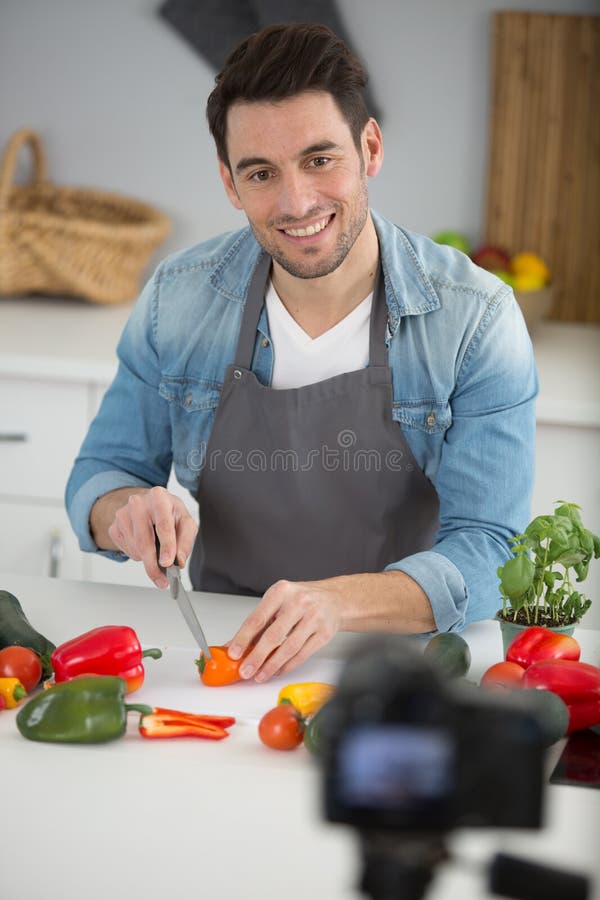 Video Camera Filming Young Smiling Male Blogger in Kitchen Stock Image ...