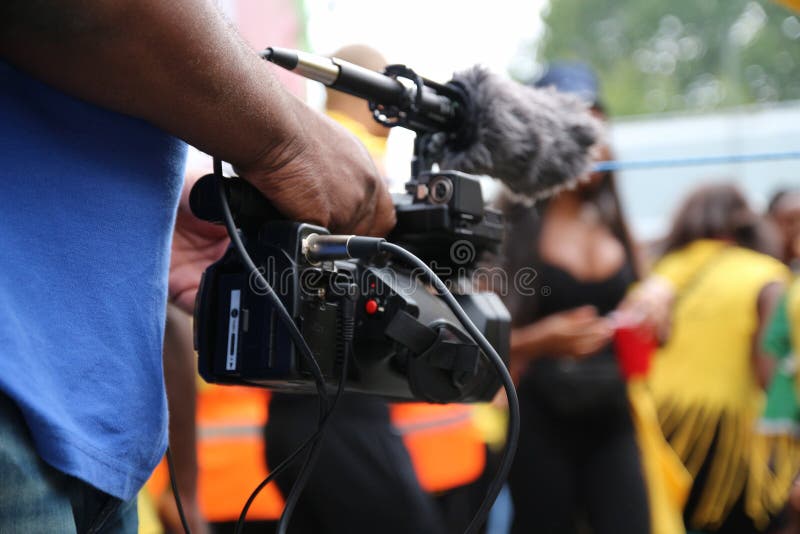 Video Camera Operator Working with His Equipment Stock Photo - Image of ...