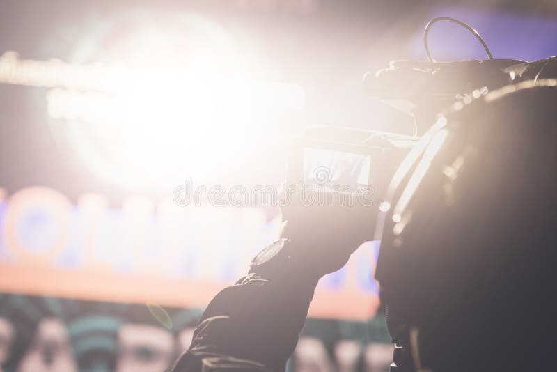 Video Camera Operator Working with His Equipment in the Award Ceremony ...