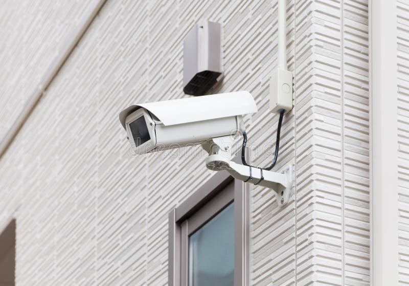 Video Camera Security System on the Wall Stock Photo - Image of camera ...