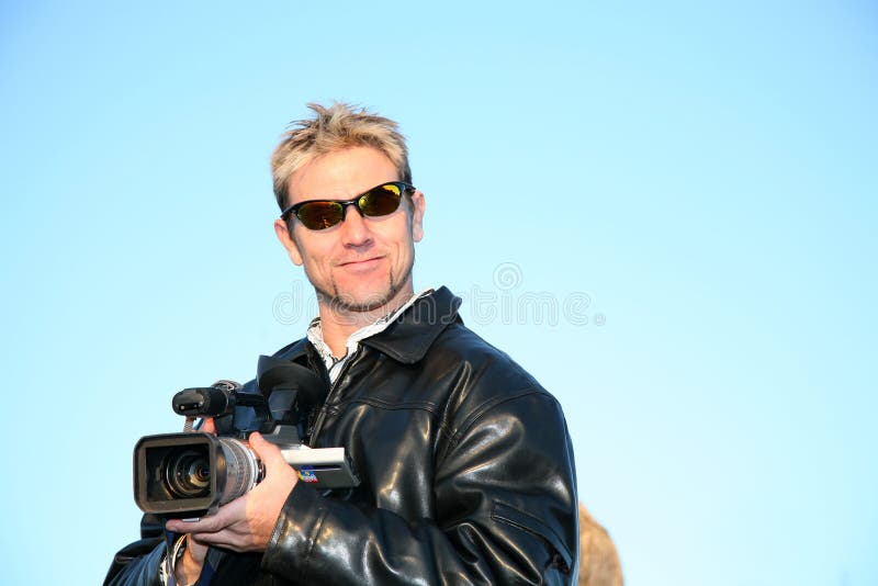 Man holding video camera stock photo. Image of record - 1713340