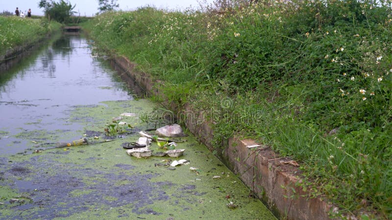 Pollution in a Water Channel, Where Various Types of Garbage Can Be ...