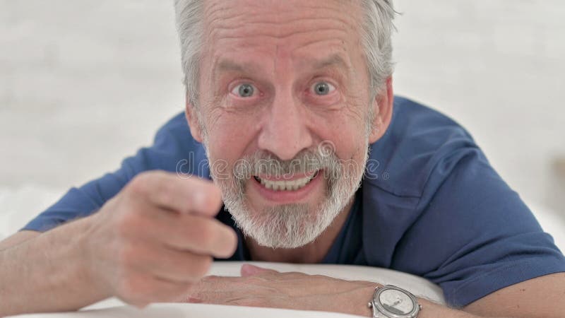 Video Chat by Senior Old Man Lying in Bed, Webcam View Stock Photo ...