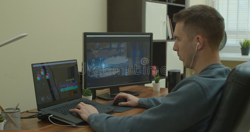 Video Editing on a Computer with Two Monitors. Monitor the Computer and ...