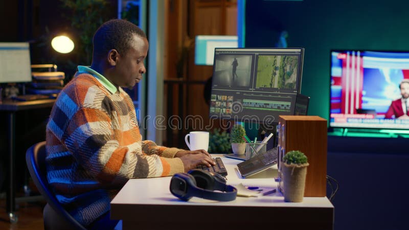 Video Editor Working on Creative Software To Create a Film Montage ...