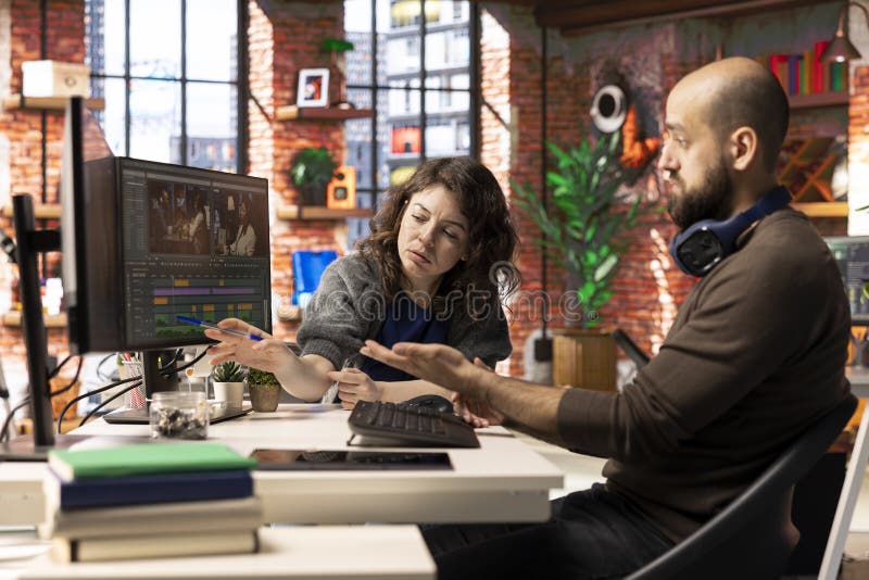 Video Editors Couple Working As a Team for a Freelance Video Shoot ...