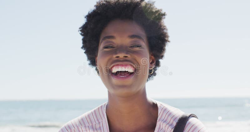 Video Of Face Of Happy African American Woman Looking At Camera On