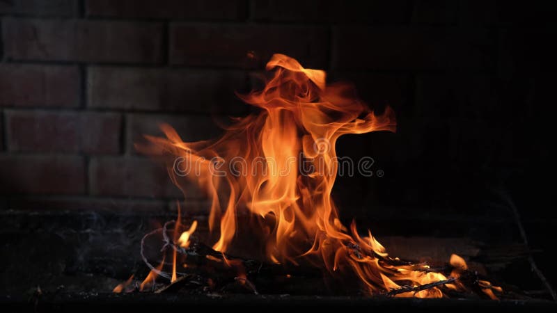 Video of Fire and Flame on a Dark Background. Flames and Burning Sparks ...