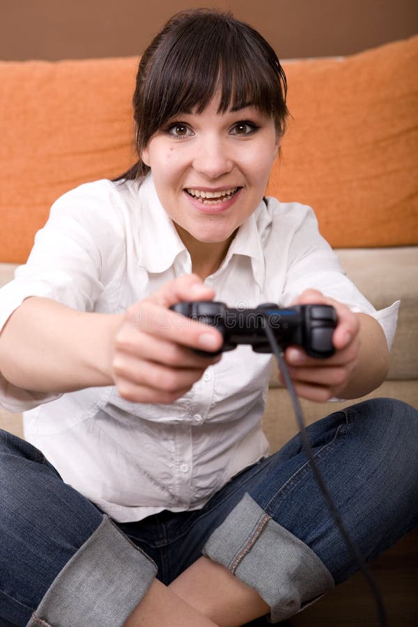 Girl Playing Video Game Console Stock Image - Image of comfortable ...
