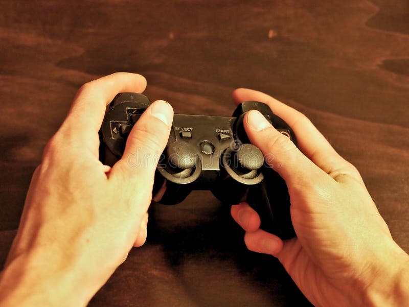 Video Game Console Controller for Gaming Held in Gamers Hands. Stock ...