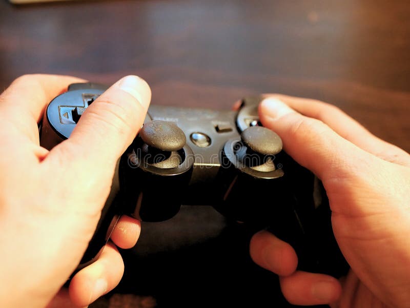 Video Game Console Controller for Gaming Held in Gamers Hands. Stock ...