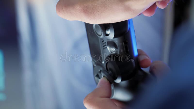 Man Hands Playing Video Games on Gaming Console in Front of TV ...
