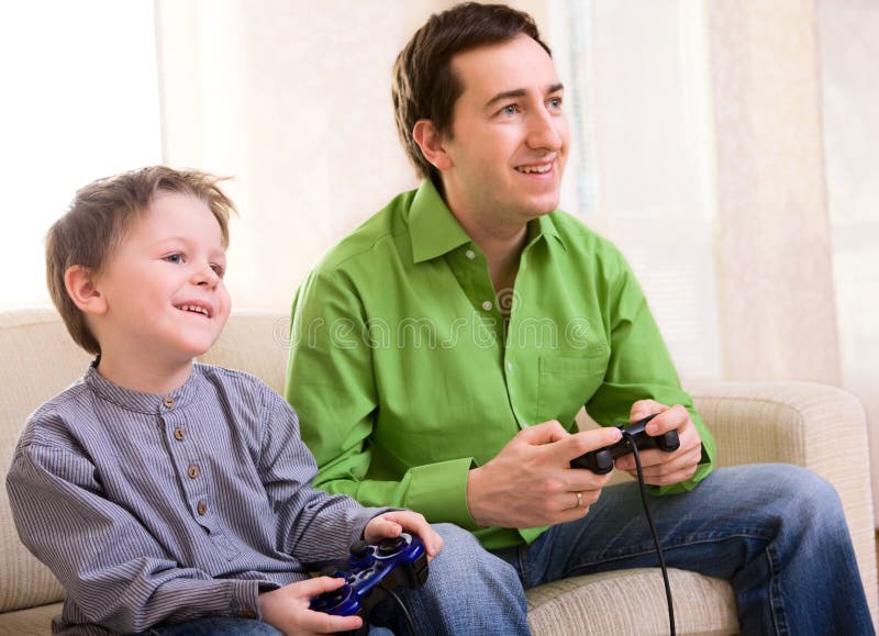 Brothers Play Video Games stock image. Image of entertainment - 18729709