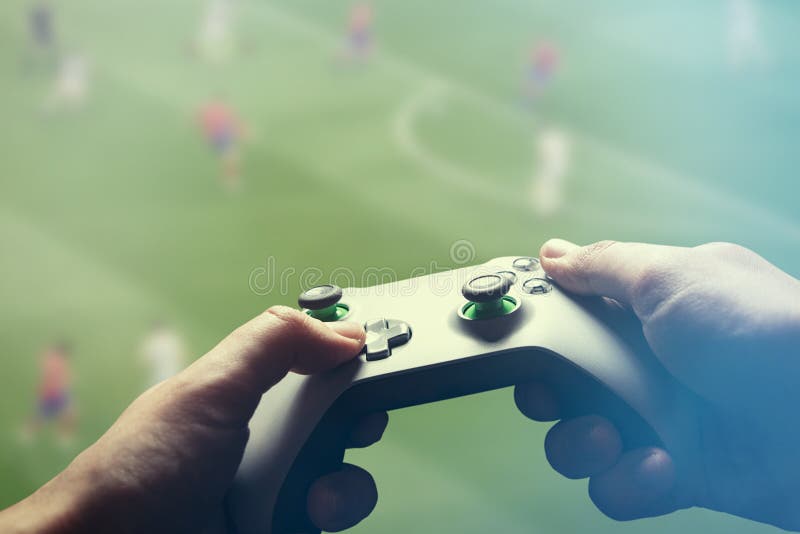 Video Gaming Console. Man Playing Soccer Game Stock Photo - Image of ...
