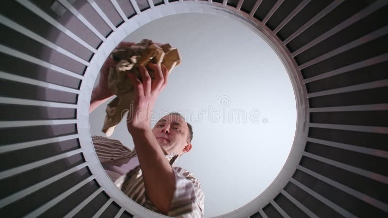 Shooting of Man Throwing Crumpled Paper S Sheets, Bottom View Stock ...