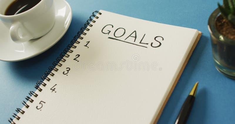 Video of Notebook with Goals and Copy Space, Coffee and Pencil on Blue ...