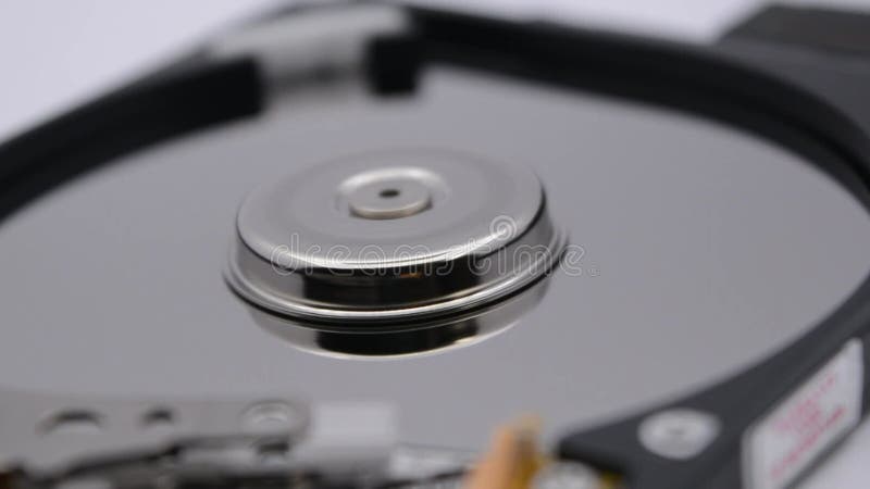 Video of Opened Hard Disk Drive with Spinning Platter. Close Up of a ...