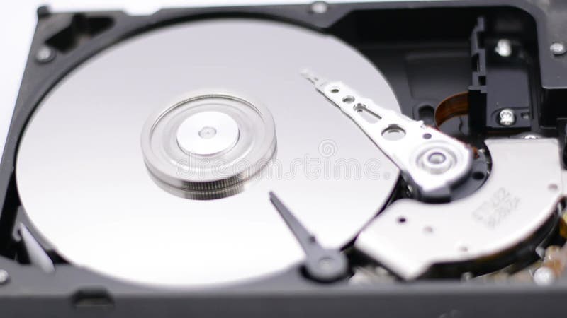 Video of Opened Hard Disk Drive with Spinning Platter. Close Up of a ...