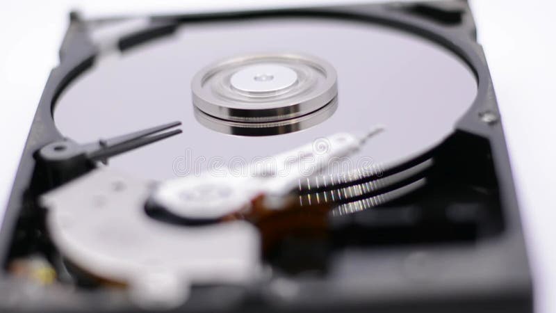 Video of Opened Hard Disk Drive with Spinning Platter. Close Up of a ...