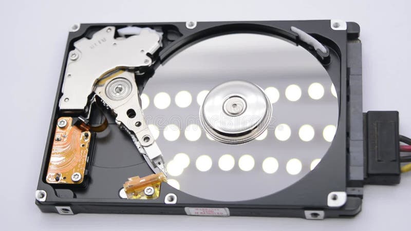 Video of Opened Hard Disk Drive with Spinning Platter. Close Up of a ...