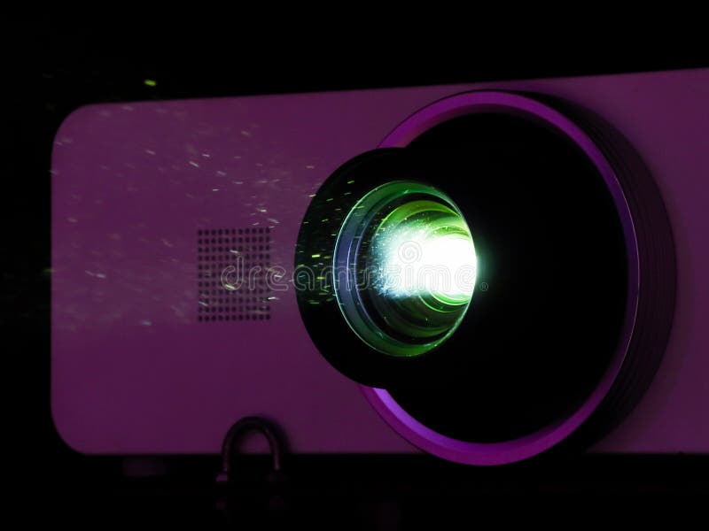 The Video Projector. the Beam of Light from the Lens, Dust in the Air ...