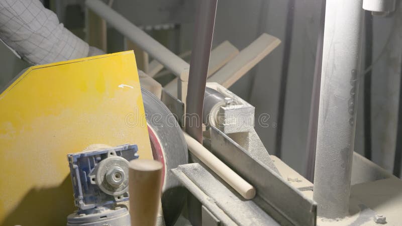 The Video Shows a Woodworking Process, Where a Spinning Machine Smooths ...