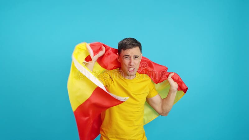 Man Dancing and Encouraging with a Spanish Flag Unfurled Stock Video ...