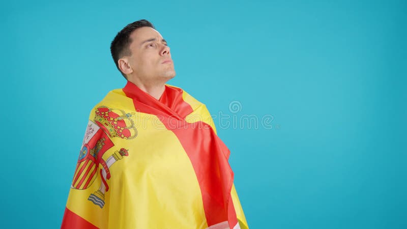 Proud Man Wrapped with a Spanish Flag Looking Up Stock Video - Video of ...