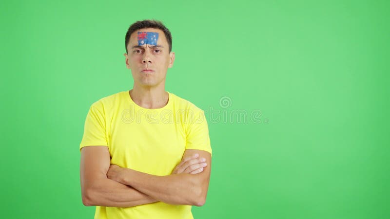 Dignified and Serious Man with Australian Flag Painted on Face Stock ...