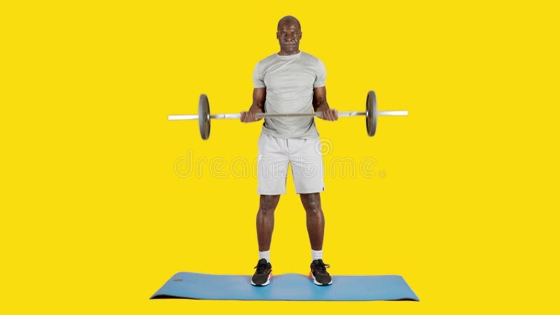 African Man Doing Curl Biceps Exercise with Dumbbells Alternating Arm ...