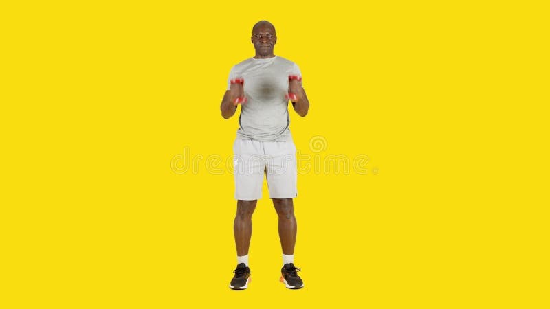 African Man Doing Curl Biceps Exercise with Dumbbells Alternating Arm ...