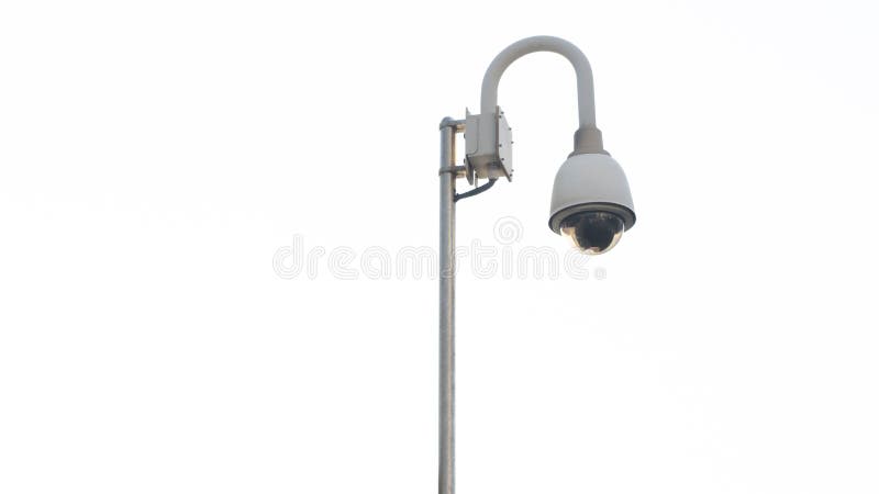 Video Surveillance Camera on a Pole Against a White Sky. Stock Image ...