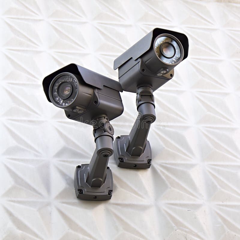 Video Surveillance Camera on a Wall of the Building Stock Photo - Image ...
