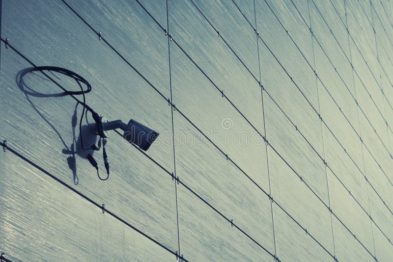 Video Surveillance Camera on a Wall of the Building Stock Image - Image ...