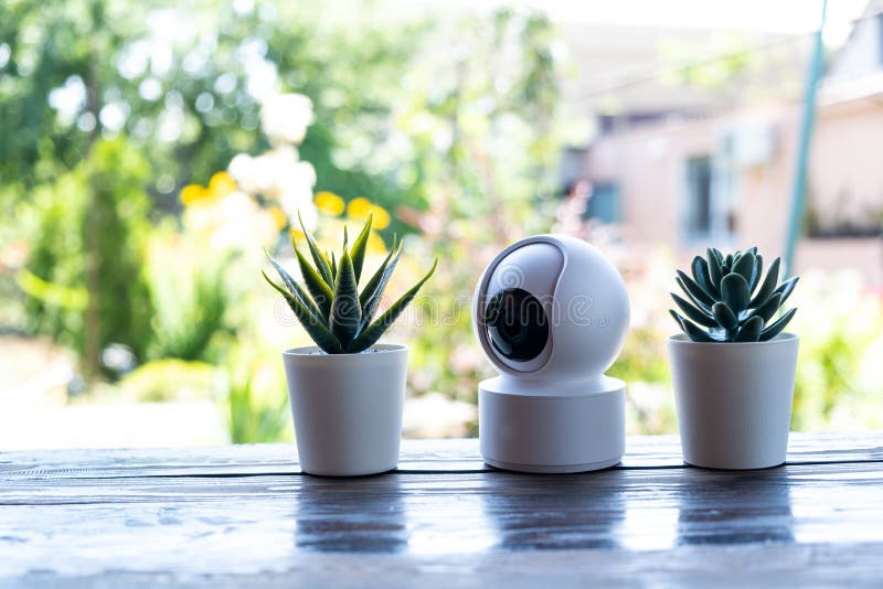 Video Surveillance Equipment on the Table. Compact Security Camera for ...