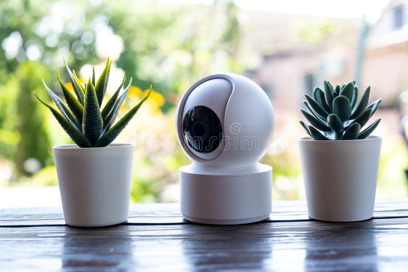 Video Surveillance Equipment on the Table. Compact Security Camera for ...