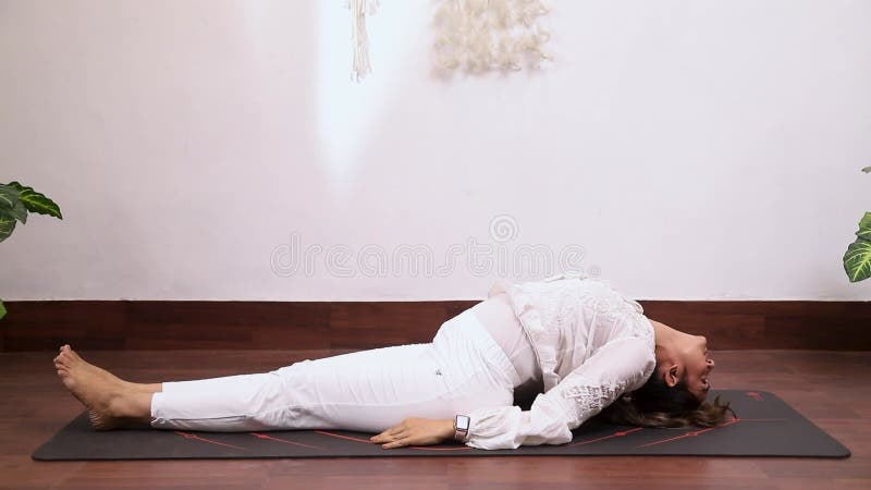 Video of Woman Performing Fish Pose (Matsyasana) Stock Footage - Video ...