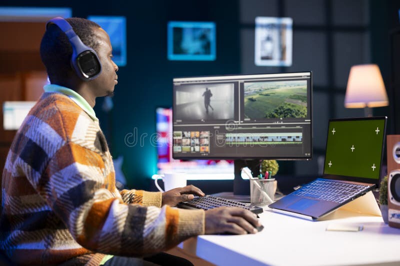 Videographer Creating Visual Effects on Montage Next To Green Screen ...