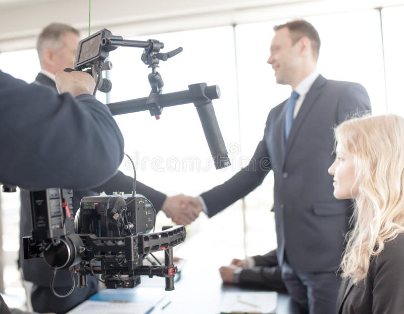 Videographer Making Video of Business People Stock Photo - Image of ...