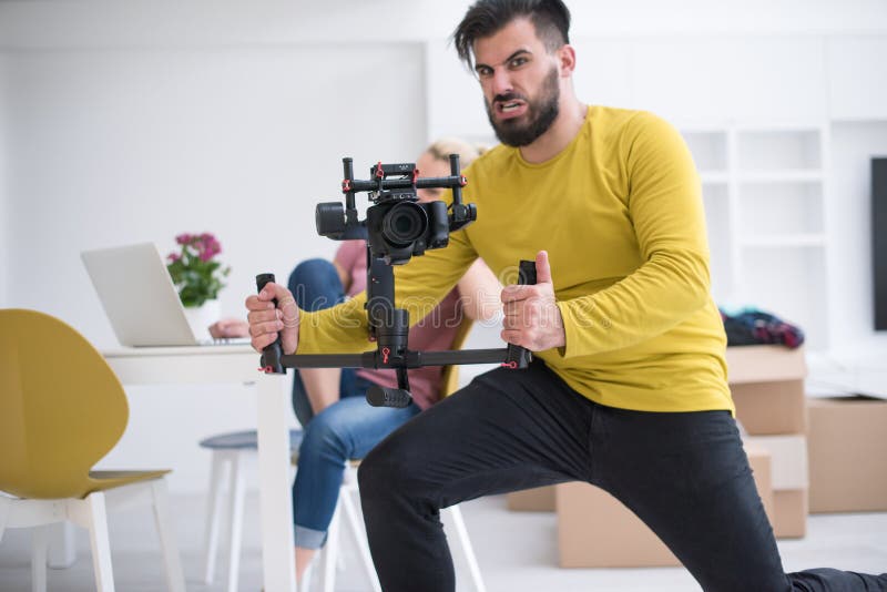 Videographer at work stock image. Image of business, hand - 87830423