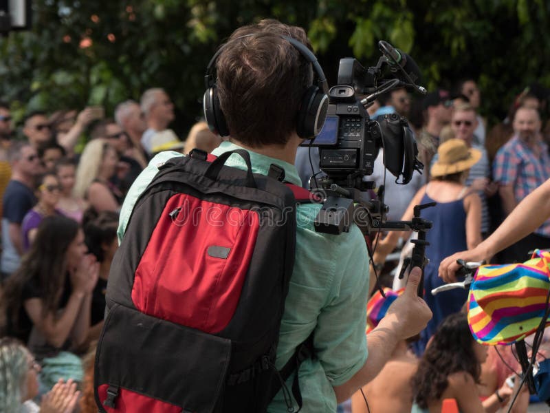 Videographer Working Outdoor Filming Crowd Event Video Camera Rig Mic ...
