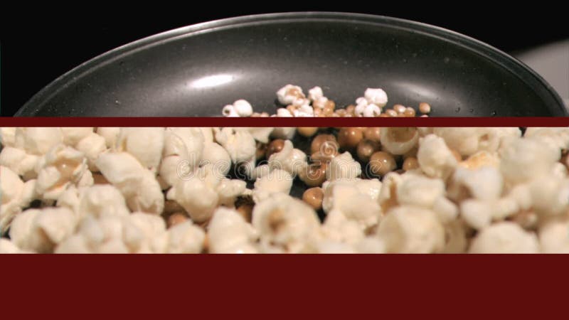 Videos of popcorn popping stock video. Video of bouncing - 43118817